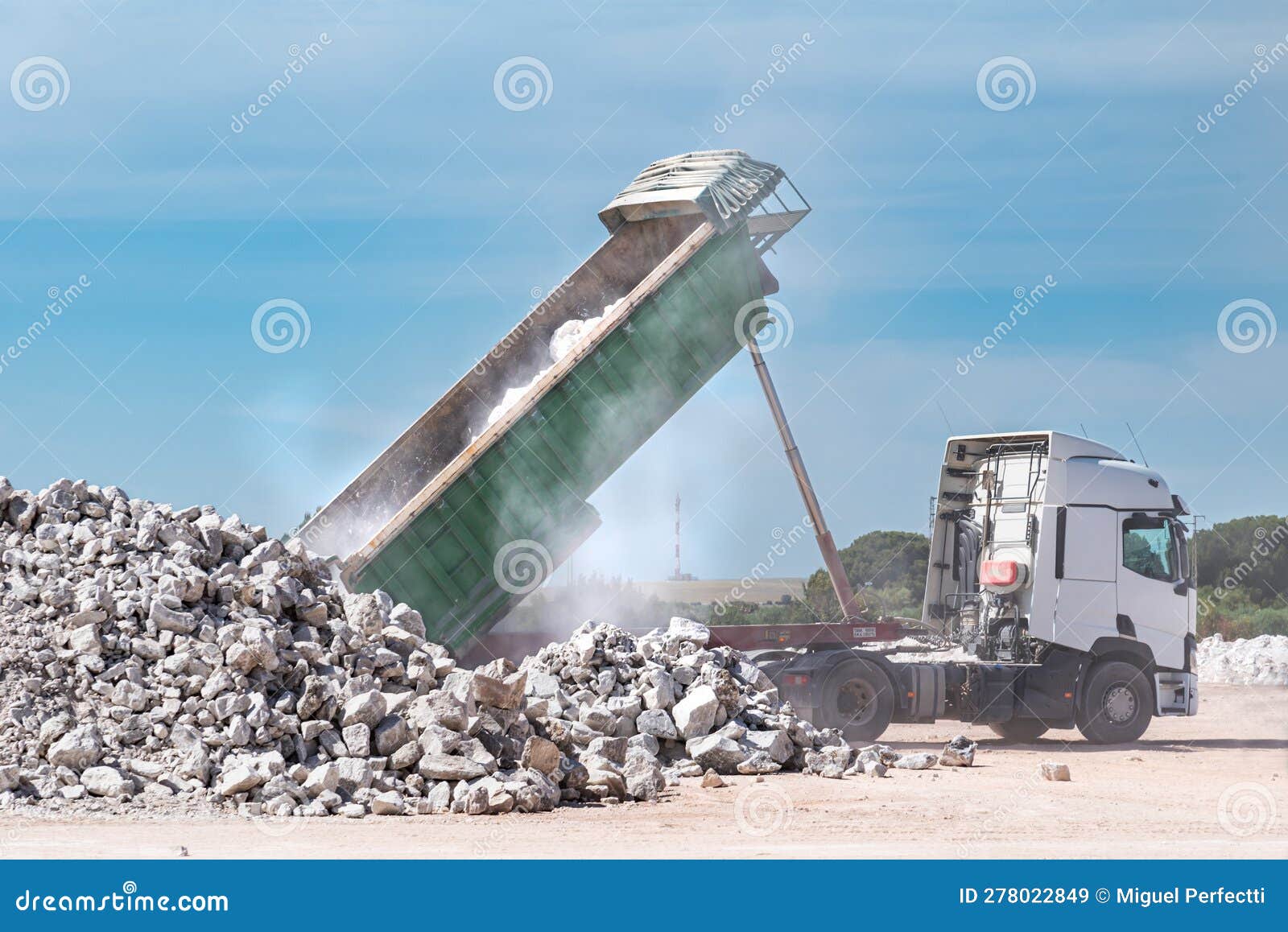 Tipper Truck Unloading Plaster Stones in a Stockpile for Processing ...