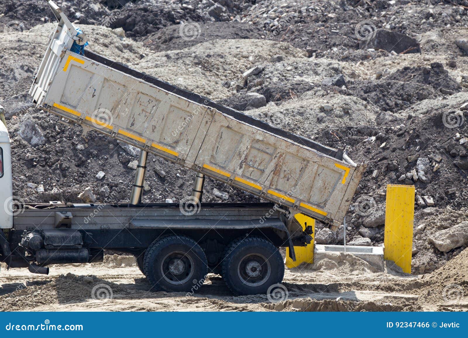Tipping Truck at Construction Site Stock Photo - Image of driving ...