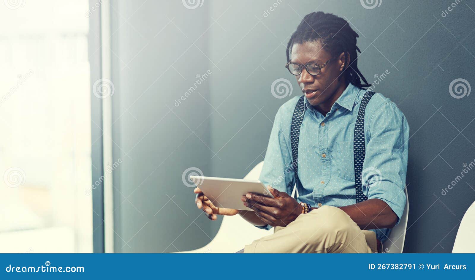 Tips for the Interview at My Fingertips. a Young Businessman Using a ...