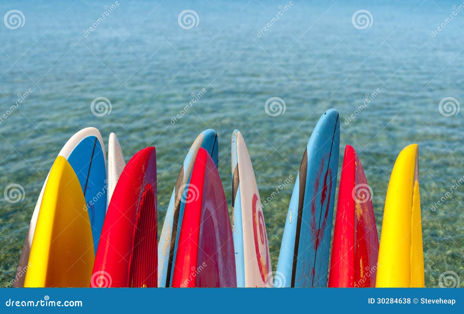 Surfboards by calm ocean stock photo. Image of summer - 30284638