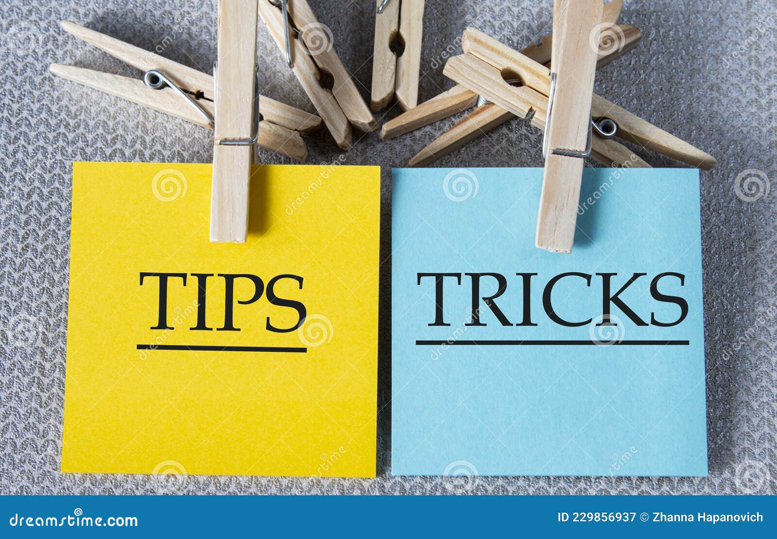 TIPS TRICKS - Words on Multicolored Writing Paper on Gray Background ...