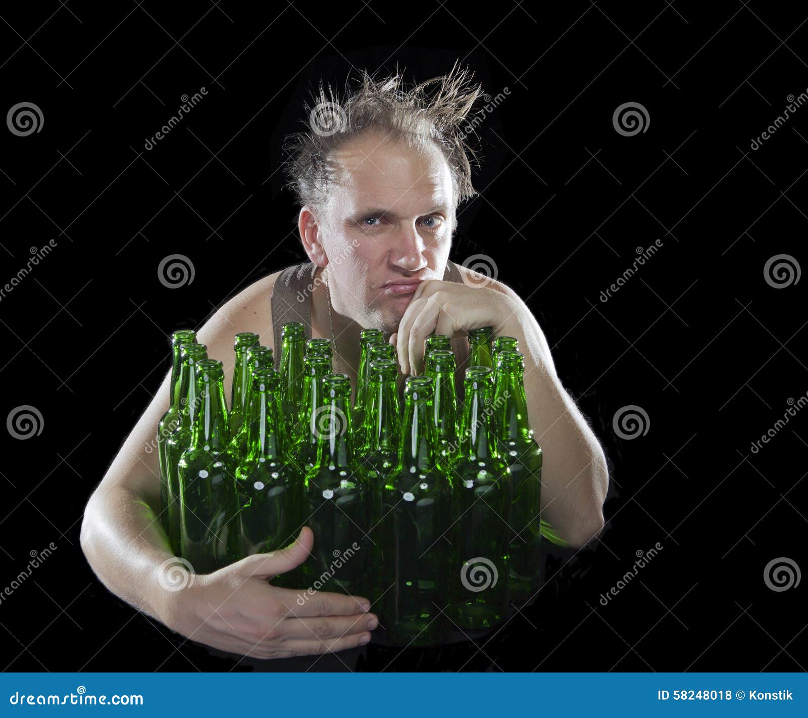 Tipsy Man Sits with a Heap of Beer Bottles, a Hangover Stock Photo ...