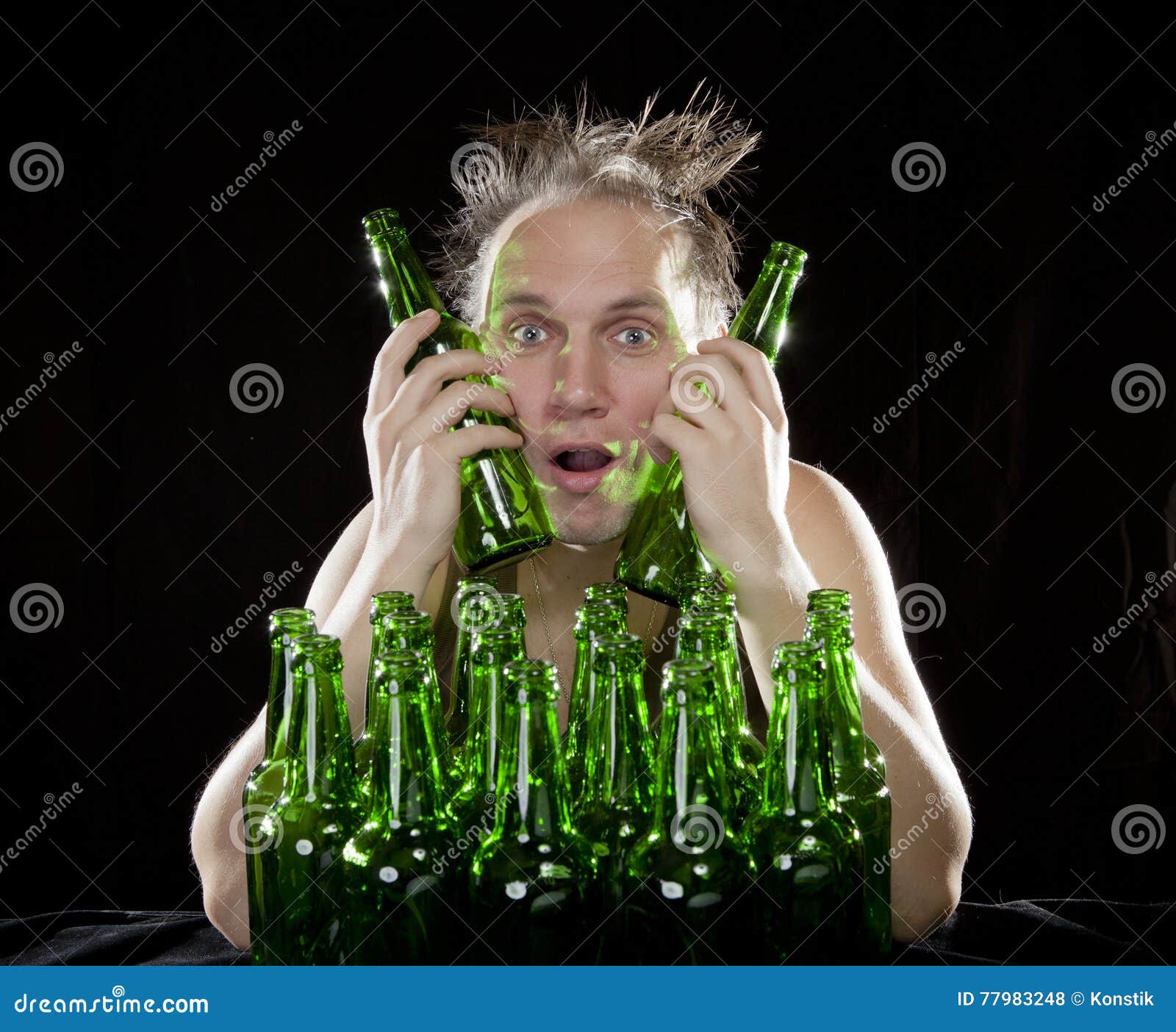 The Tipsy Man Sits with a Heap of Beer Bottles, a Hangover Stock Photo ...
