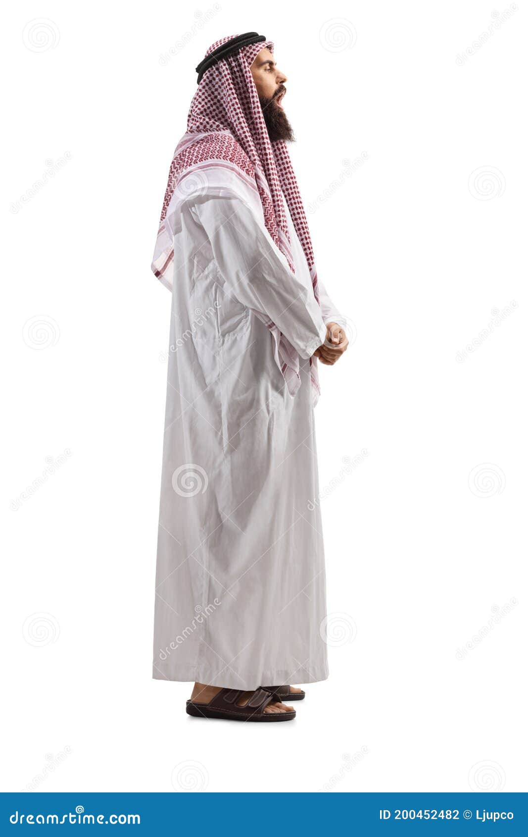 Tir Intégral De Profil D'un Homme Arabe Dans Un Thobe Debout Et ... Tir Intégral De Profil D'un Homme Arabe Dans Un Thobe Debout Et ...