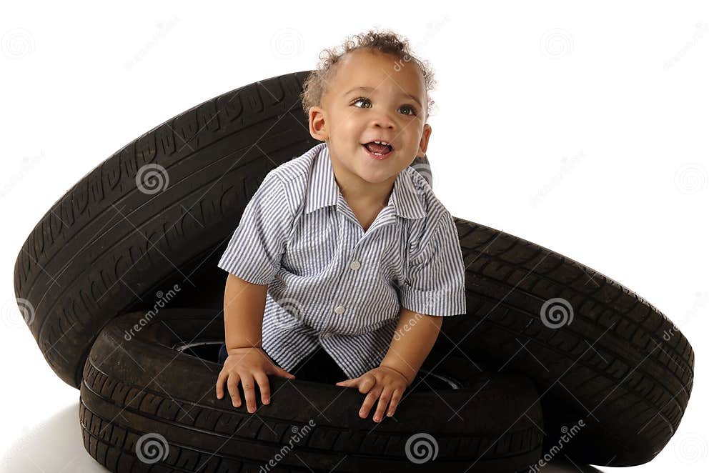 Tire Baby stock photo. Image of smiling, tires, biracial - 19026188