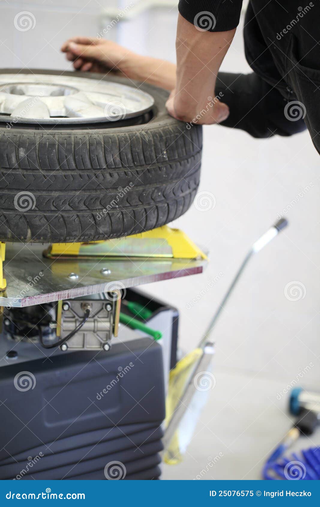 Tire changing stock image. Image of collar, adjusting - 25076575