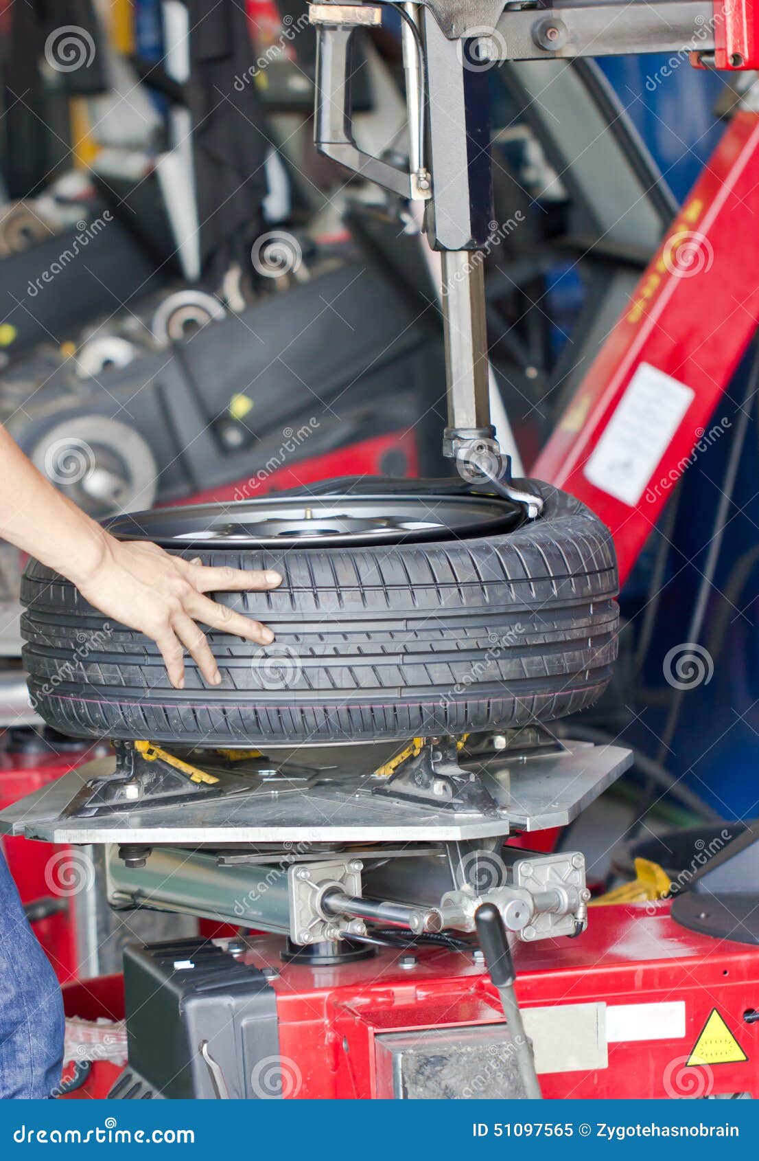 Tire Fitting Machine. stock image. Image of machine, occupation - 51097565