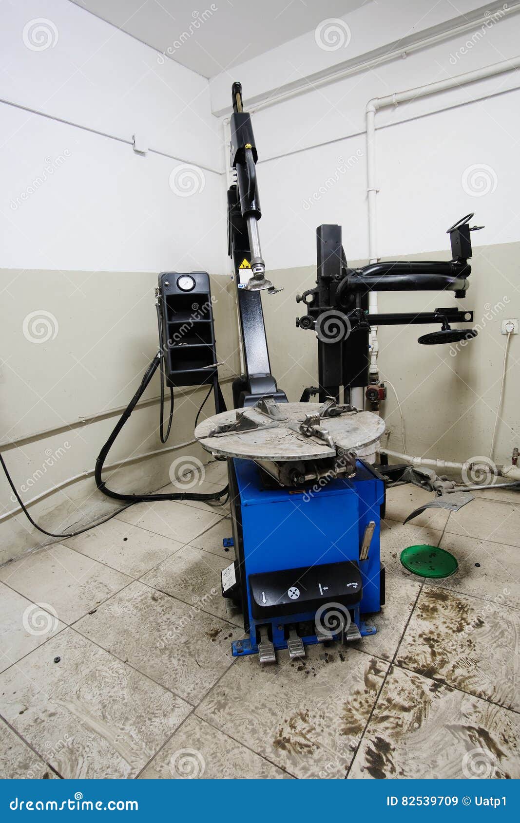 Tire fitting machine stock image. Image of repair, work - 82539709