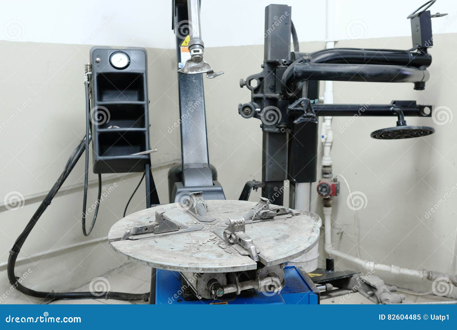 Tire fitting machine stock image. Image of auto, engineer - 82604485