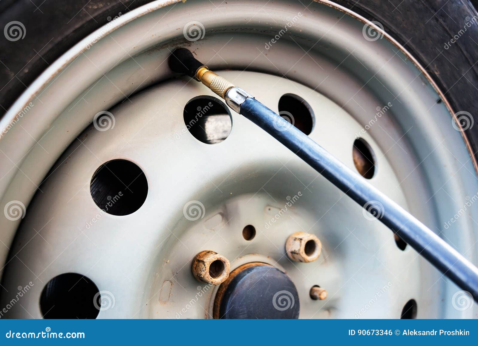 Tire Inflation Hose Inserted into Wheel Stock Photo - Image of security ...