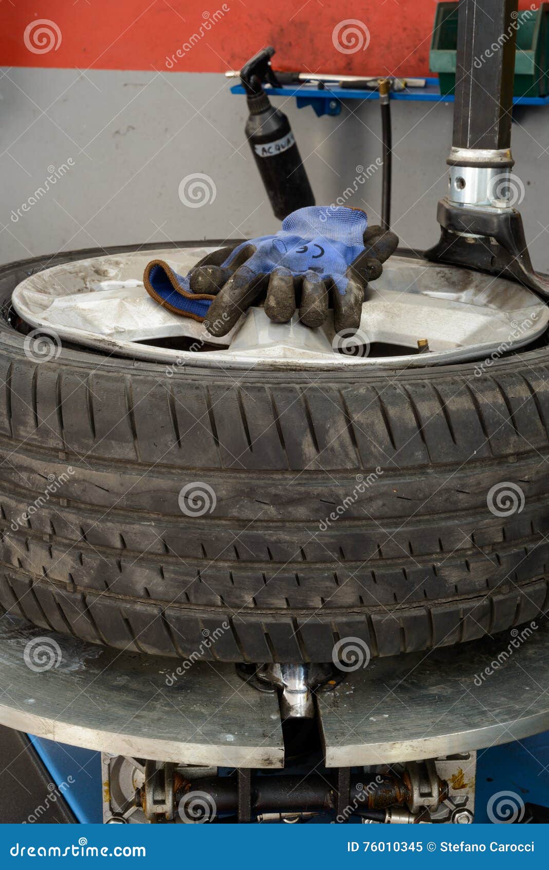 Tire on a machine for fix stock image. Image of drive - 76010345