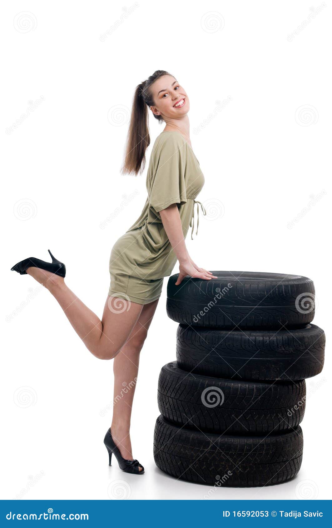 Tire and woman stock image. Image of auto, service, standing - 16592053