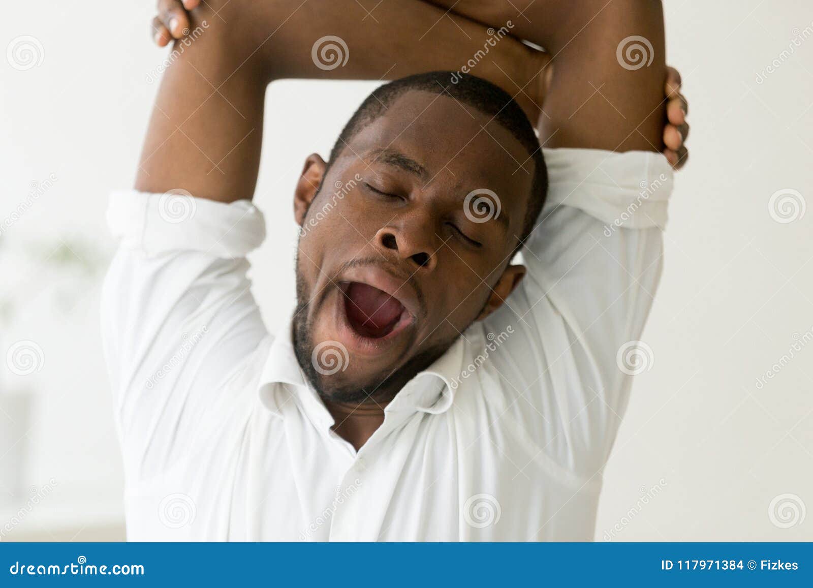 Tired African American Feeling Exhausted Yawning and Stretching Stock ... Tired African American Feeling Exhausted Yawning and Stretching Stock ...