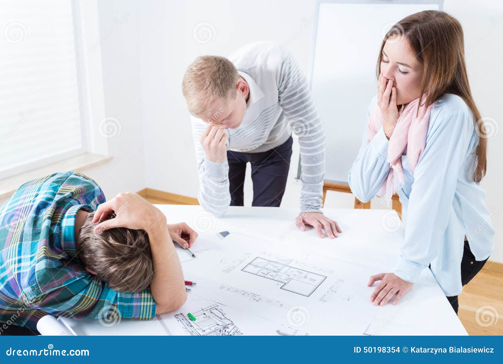 Tired architects at work stock photo. Image of builder - 50198354