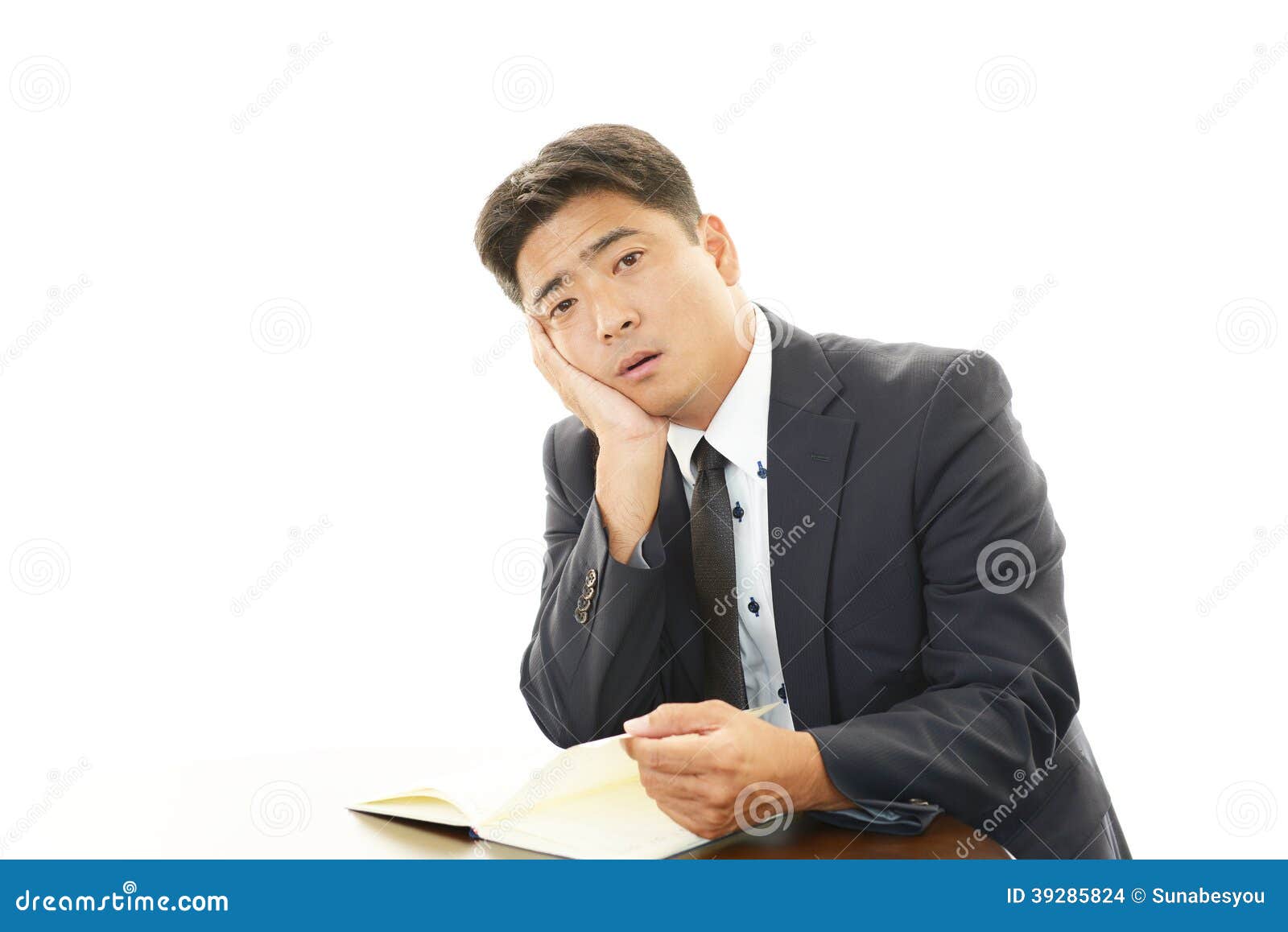 Tired Asian businessman stock photo. Image of melancholy - 39285824