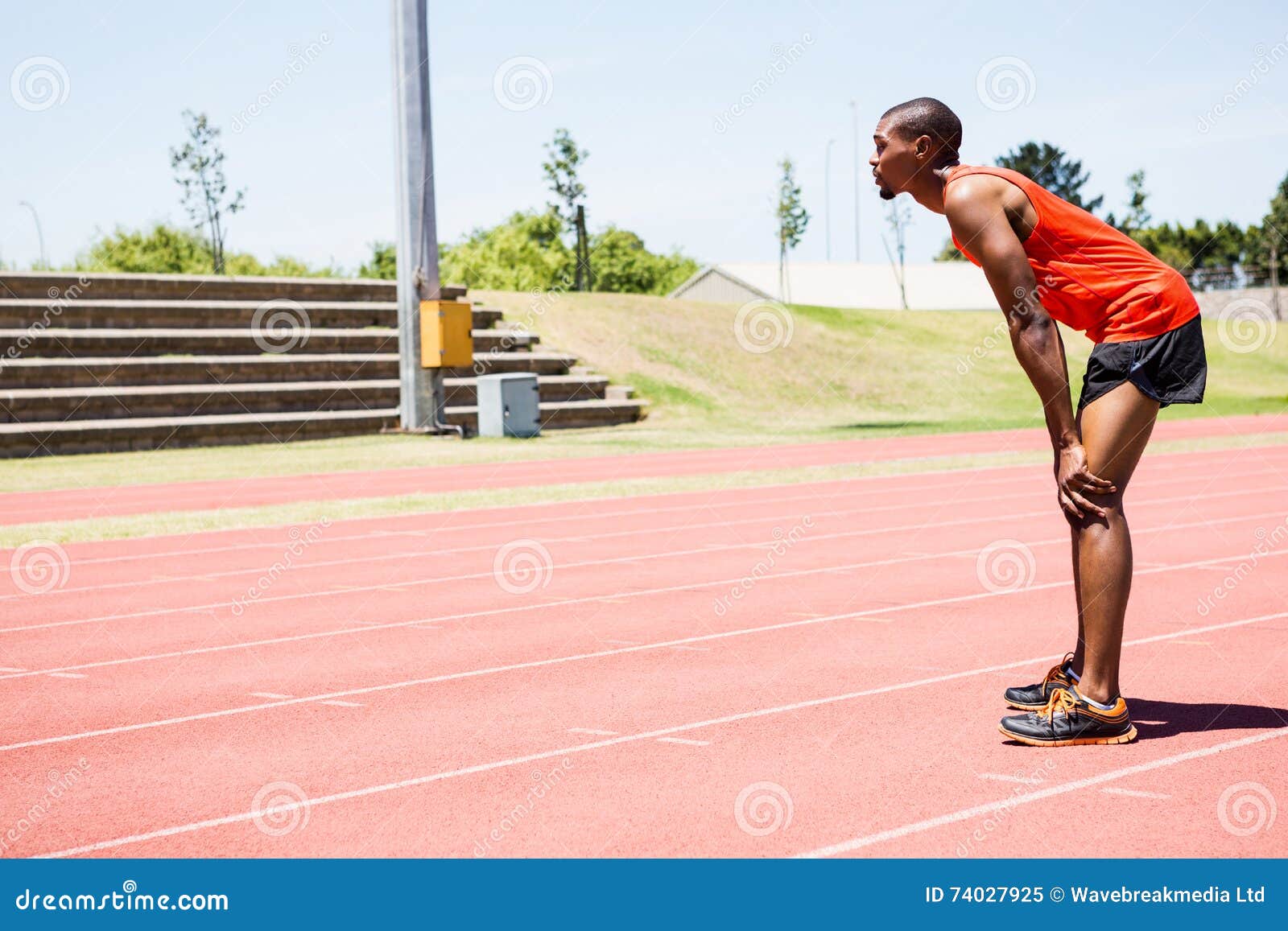 Tired Athlete Standing on Running Track Stock Image - Image of ...