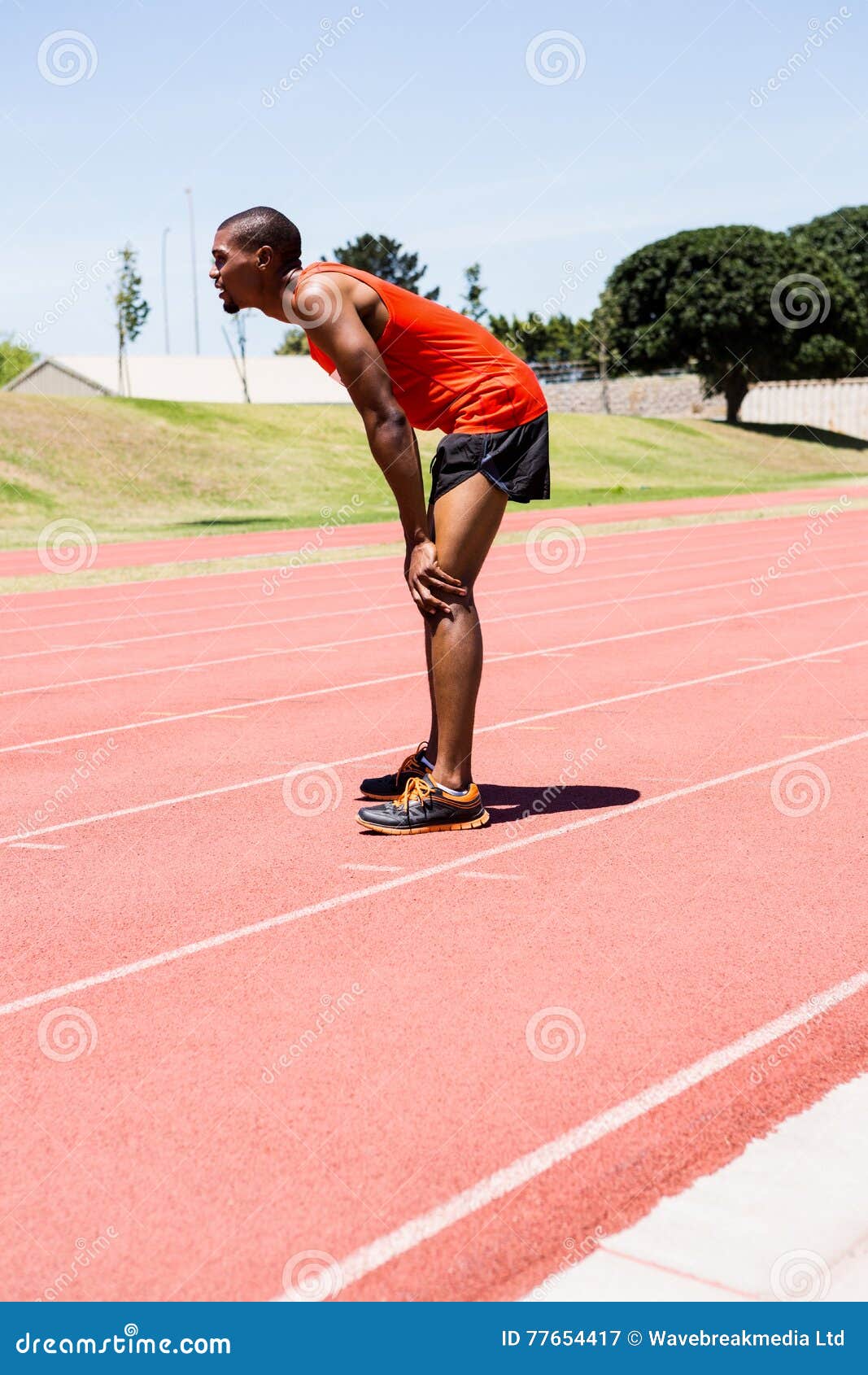 Tired Athlete Standing on Running Track Stock Image - Image of olympic ...