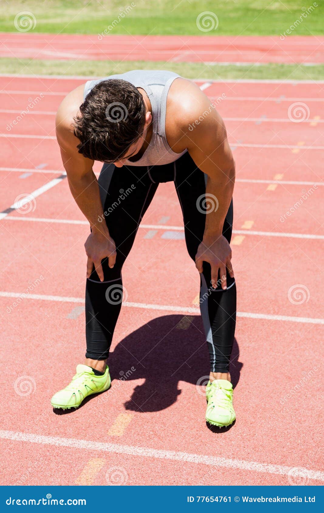 Tired Athlete Standing on Running Track Stock Image - Image of physical ...