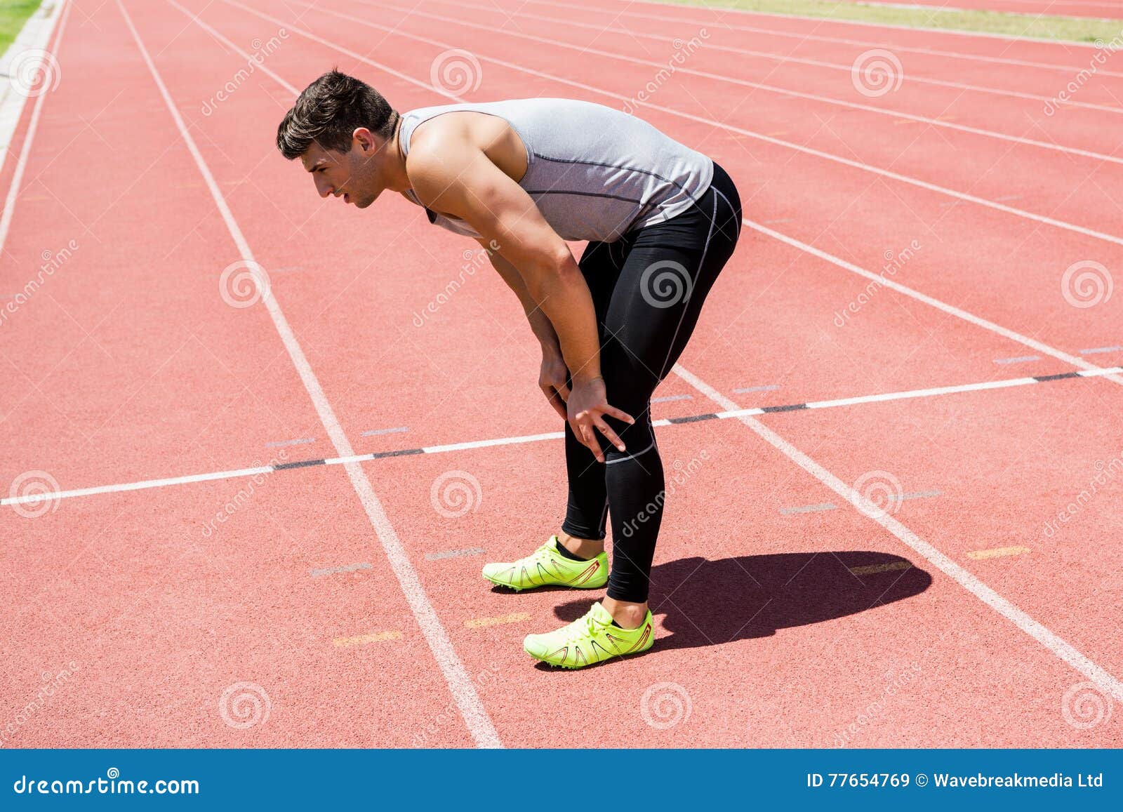 Tired Athlete Standing on Running Track Stock Image - Image of hispanic ...