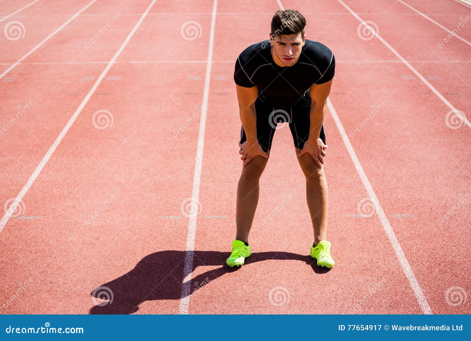 Tired Athlete Standing on Running Track Stock Image - Image of ...