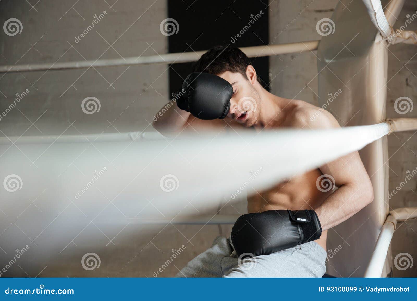 Tired Boxer Wiping the Sweat while Sitting on Ring Stock Image - Image ...