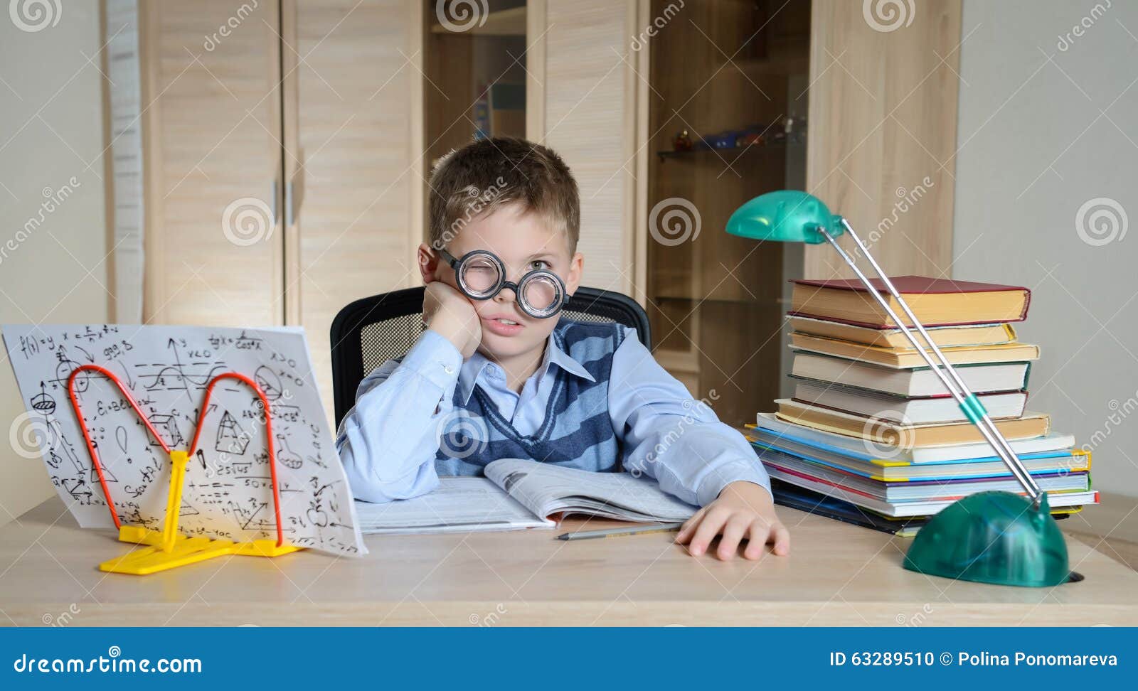 Tired Boy in Funny Glasses Doing Homework. Child with Learning ...