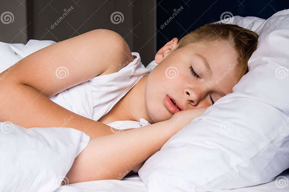 Tired Young Boy Sleeping in Bedroom Stock Image - Image of blond ...