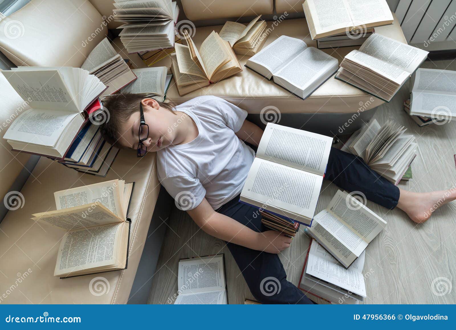 Tired Boy Sleeping Surrounded By Books In Room Stock Photo - Image ...
