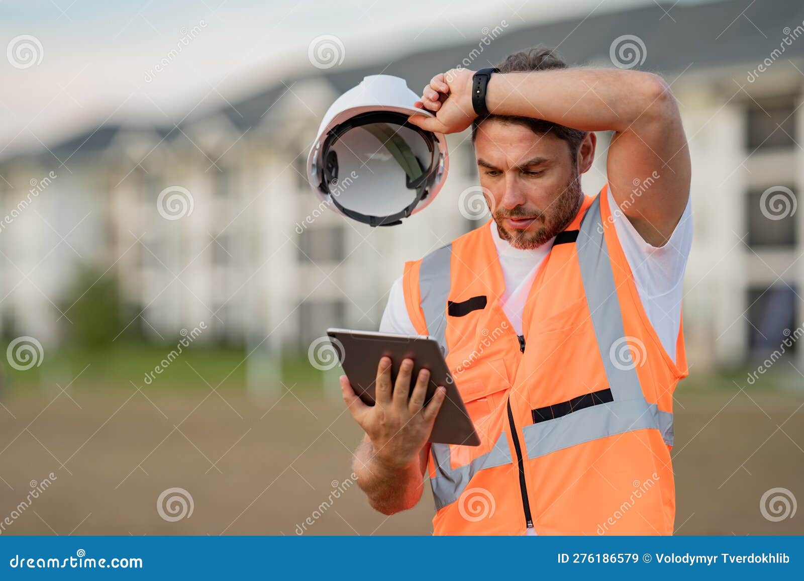 Tired Builder at Building Site. Construction Manager or Engineer in ...