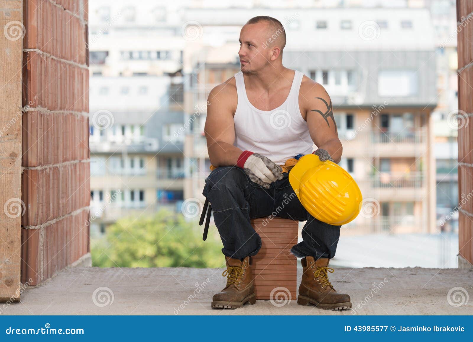 Tired Builder Resting on Brick Stock Image - Image of person ...