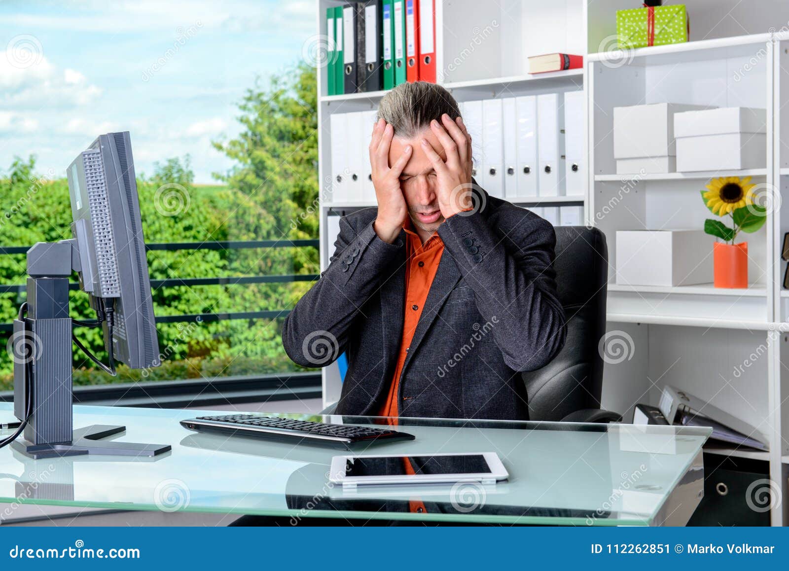 Tired Business Man with Head in Hands is Over-worked Stock Image ...