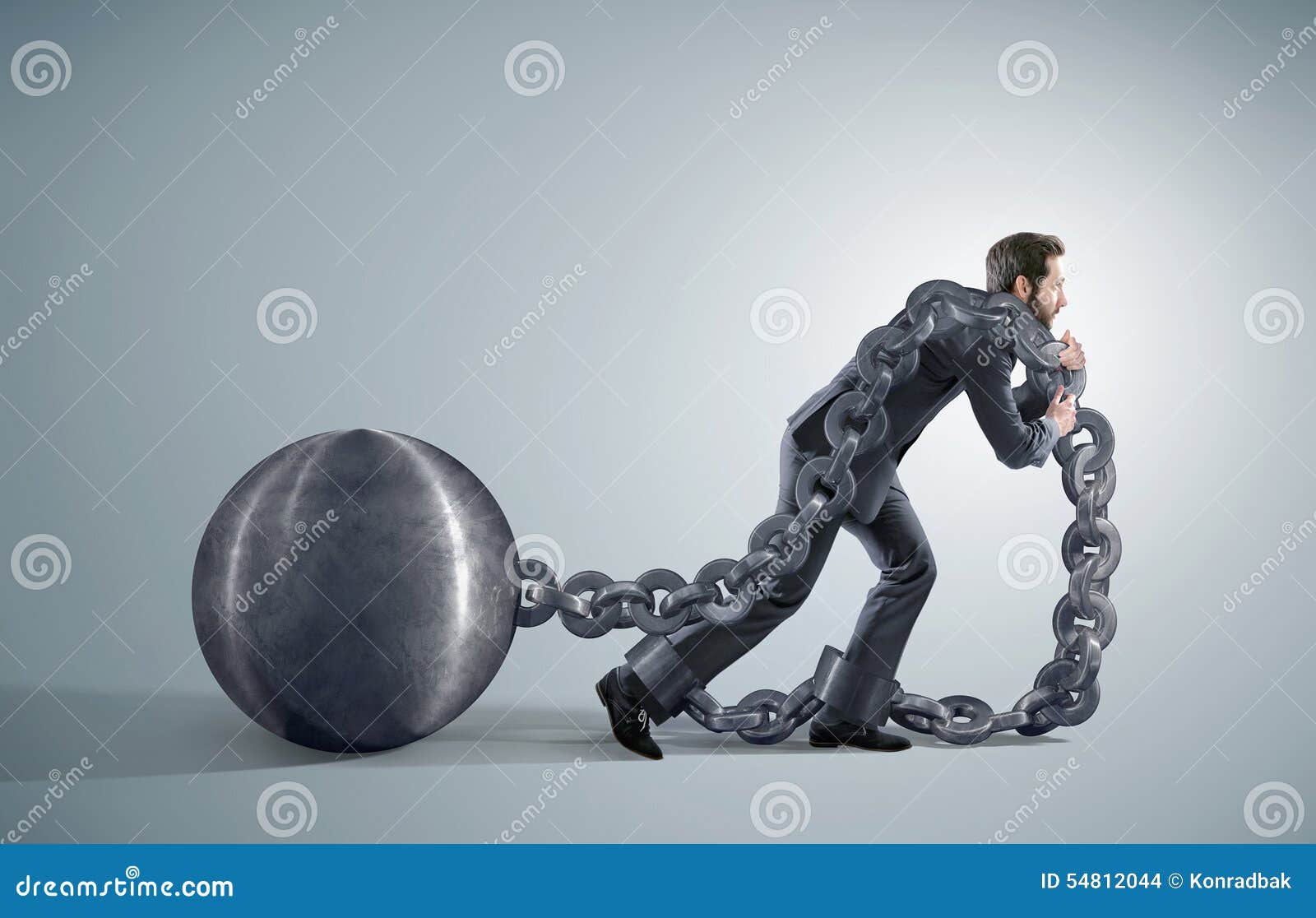 Tired Businessman Dragging Heavy Chains Royalty-Free Stock Image ...