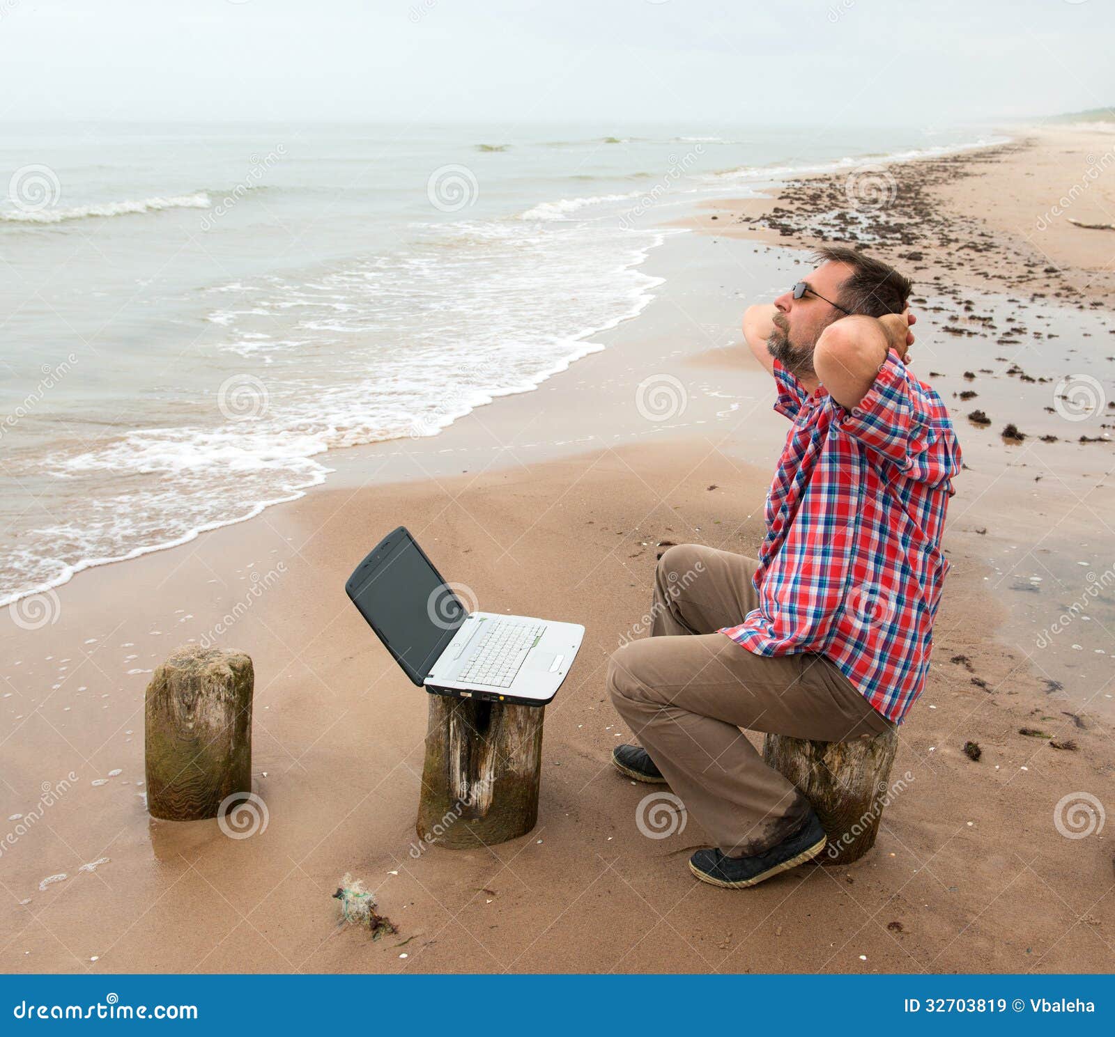 Tired Businessman Sitting with Notebook on Beach Stock Image - Image of ...