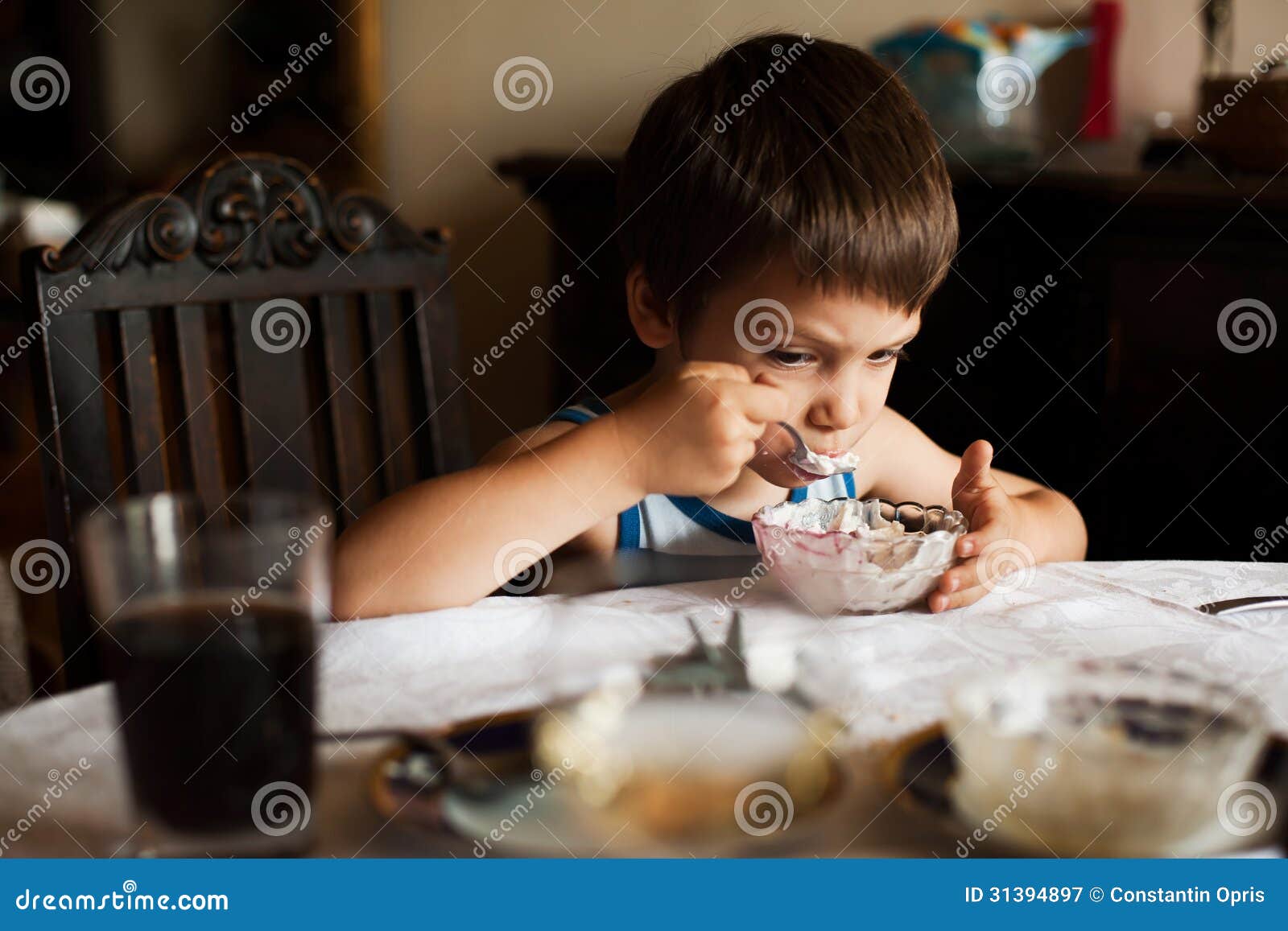 Tired child eating sweets stock image. Image of toddler - 31394897