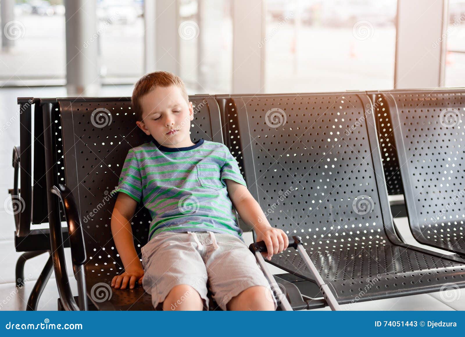 Tired Child Sleeping in Waiting Room for Passengers. Stock Image ...