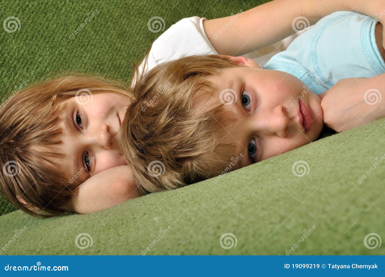 Tired children having rest stock image. Image of lying - 19099219