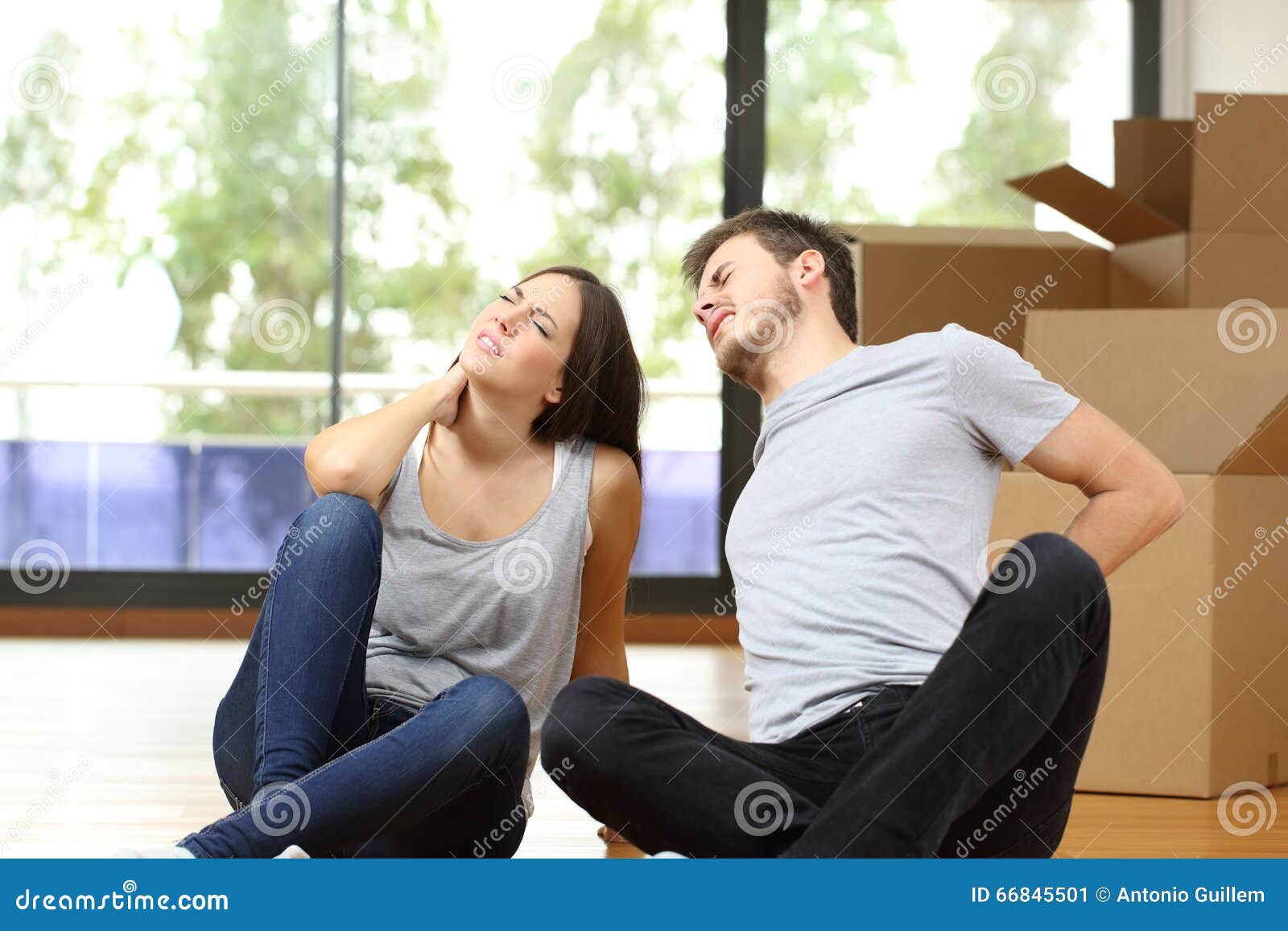 Tired Couple Moving Home Suffering Stock Image - Image of home, back ...