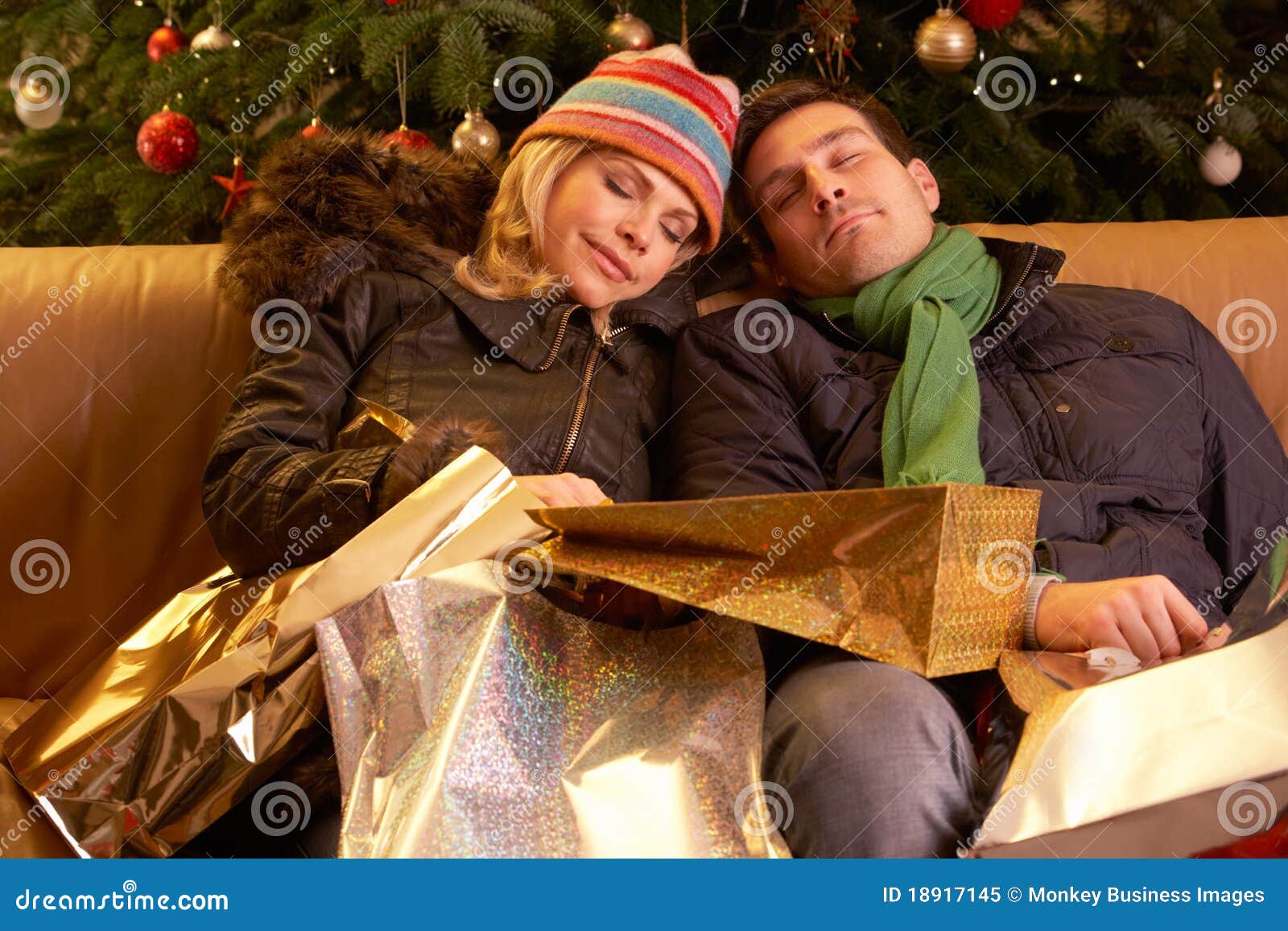 Tired Couple Returning after Christmas Shopping Stock Image - Image of ...