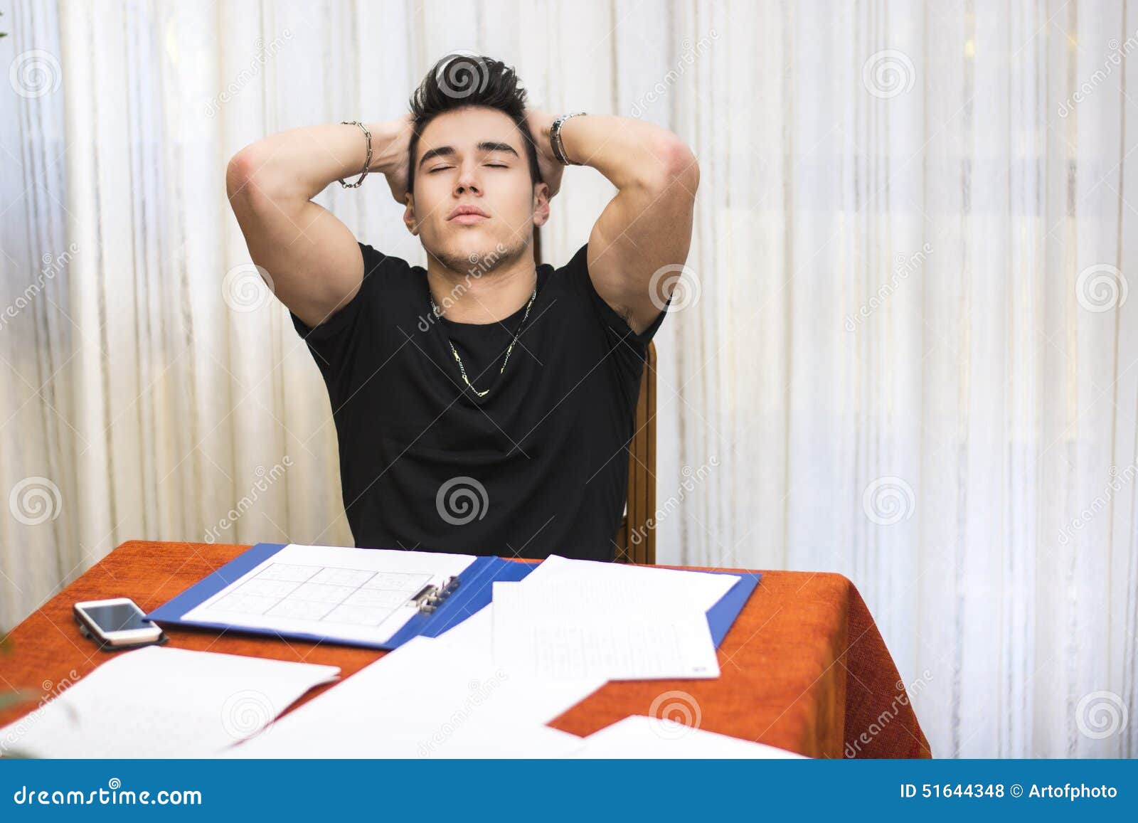 Tired or Despondent Young Man Doing Homework Stock Photo - Image of ...