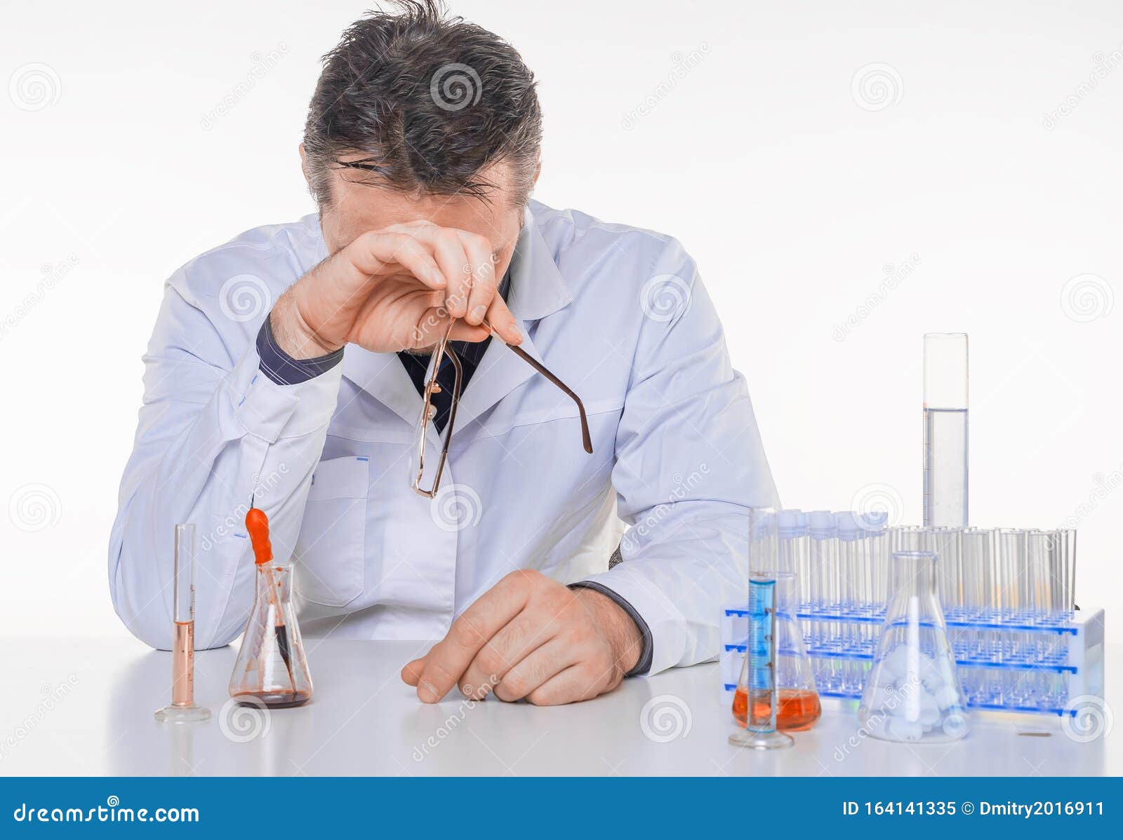 Tired Doctor in Laboratory. Photo on White Background. Stock Image ...