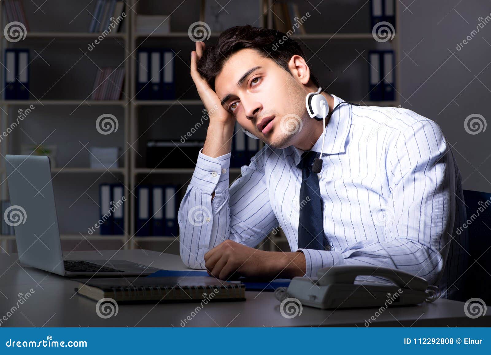 The Tired and Exhausted Helpdesk Operator during Night Shift Stock ...