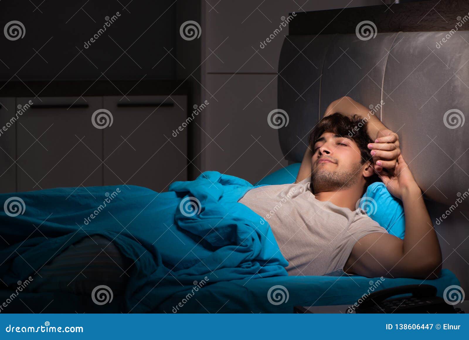 The Tired Exhausted Man Sleeping in His Bed Stock Image - Image of ...