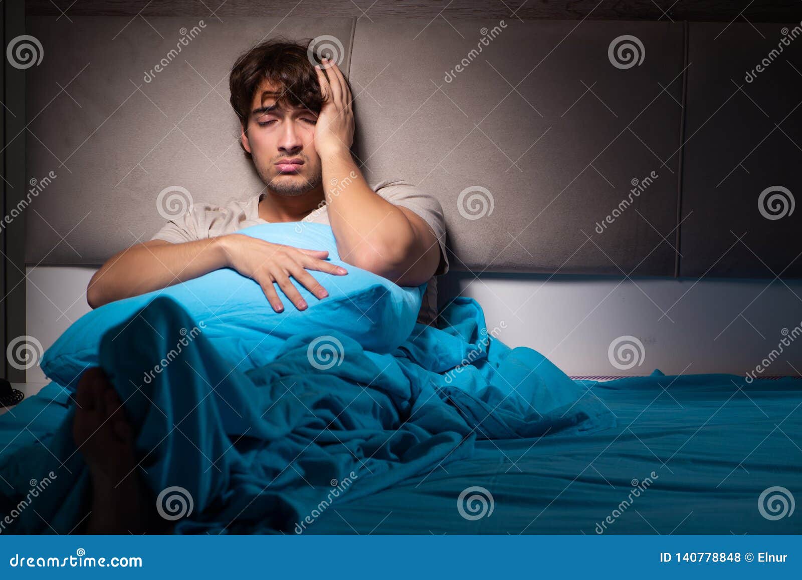 The Tired Exhausted Man Sleeping in His Bed Stock Photo - Image of ...