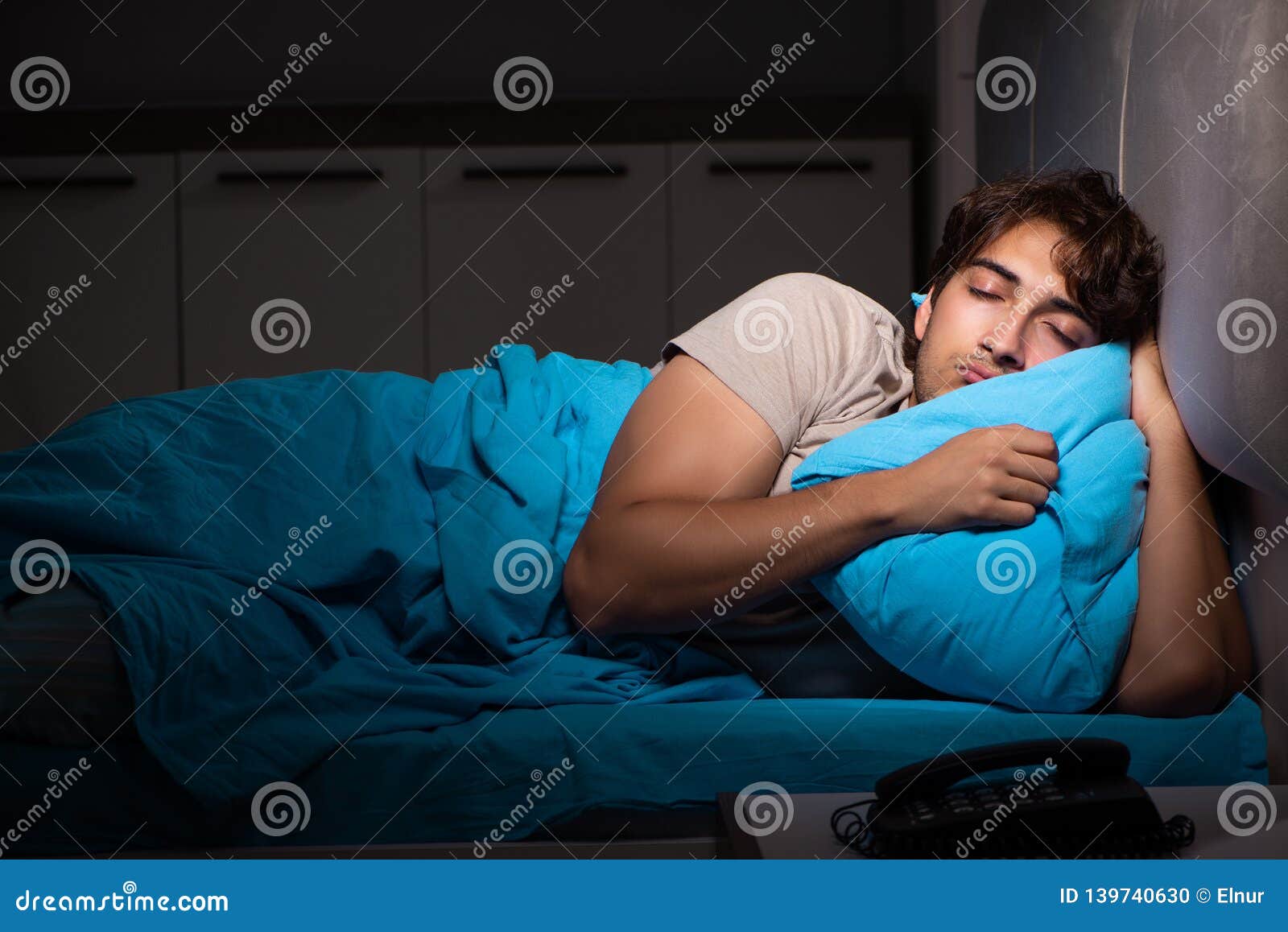 The Tired Exhausted Man Sleeping in His Bed Stock Photo - Image of ...
