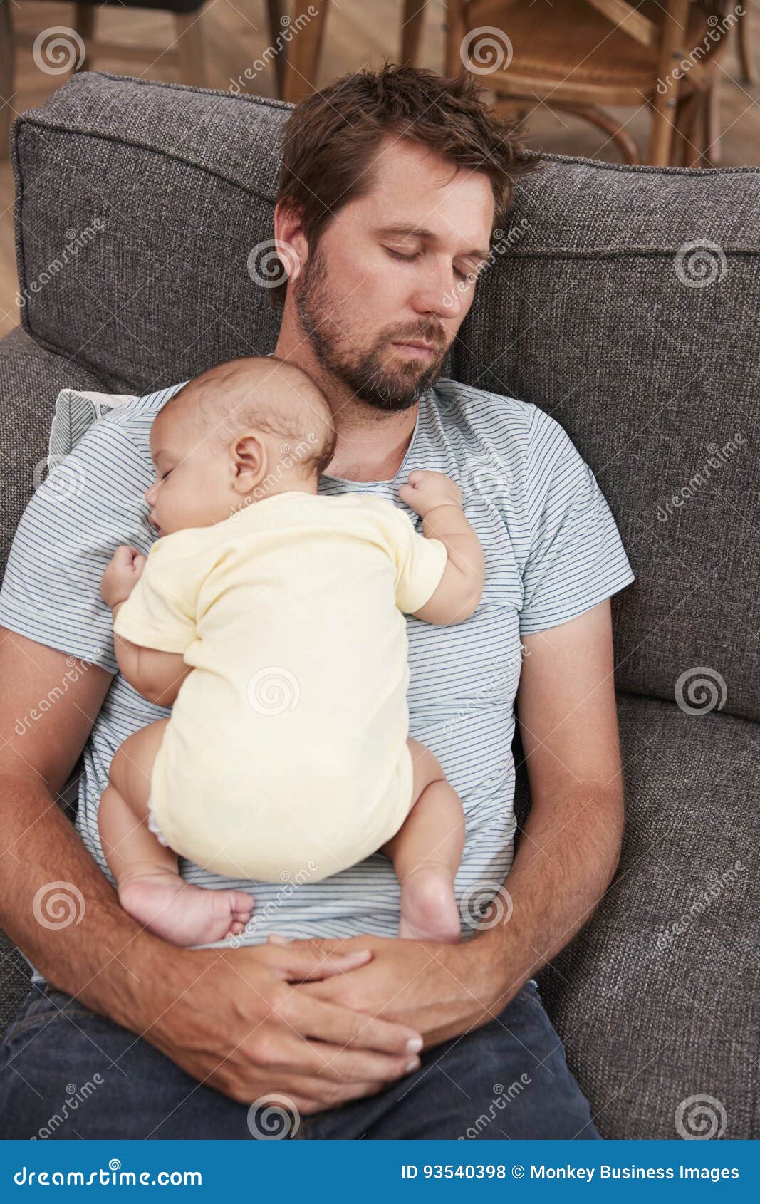 Tired Father with Baby Son Sleeping on Sofa Together Stock Photo ...