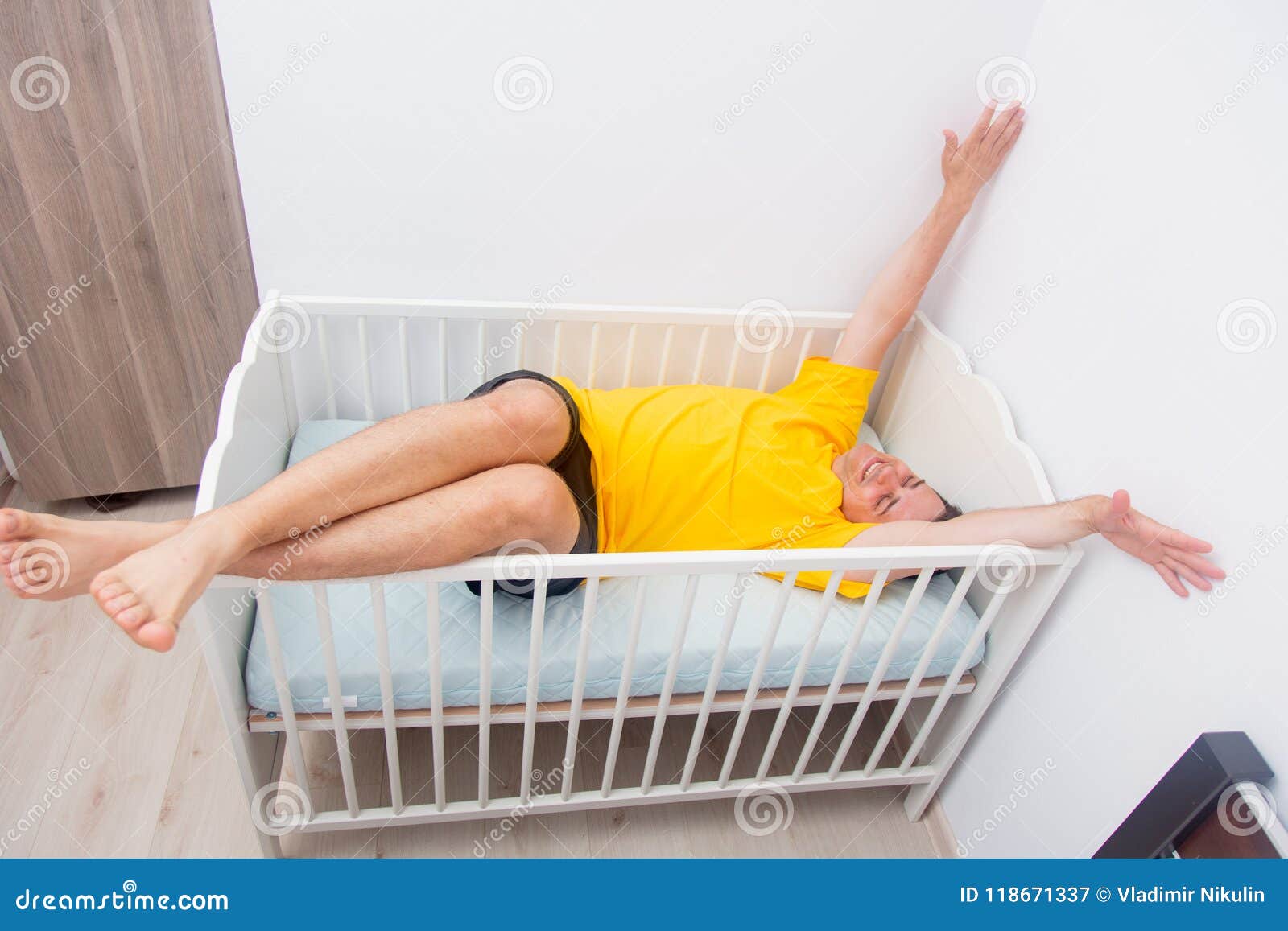 Tired Father Sleep in a Child Cot Stock Image - Image of healthy, cute ...