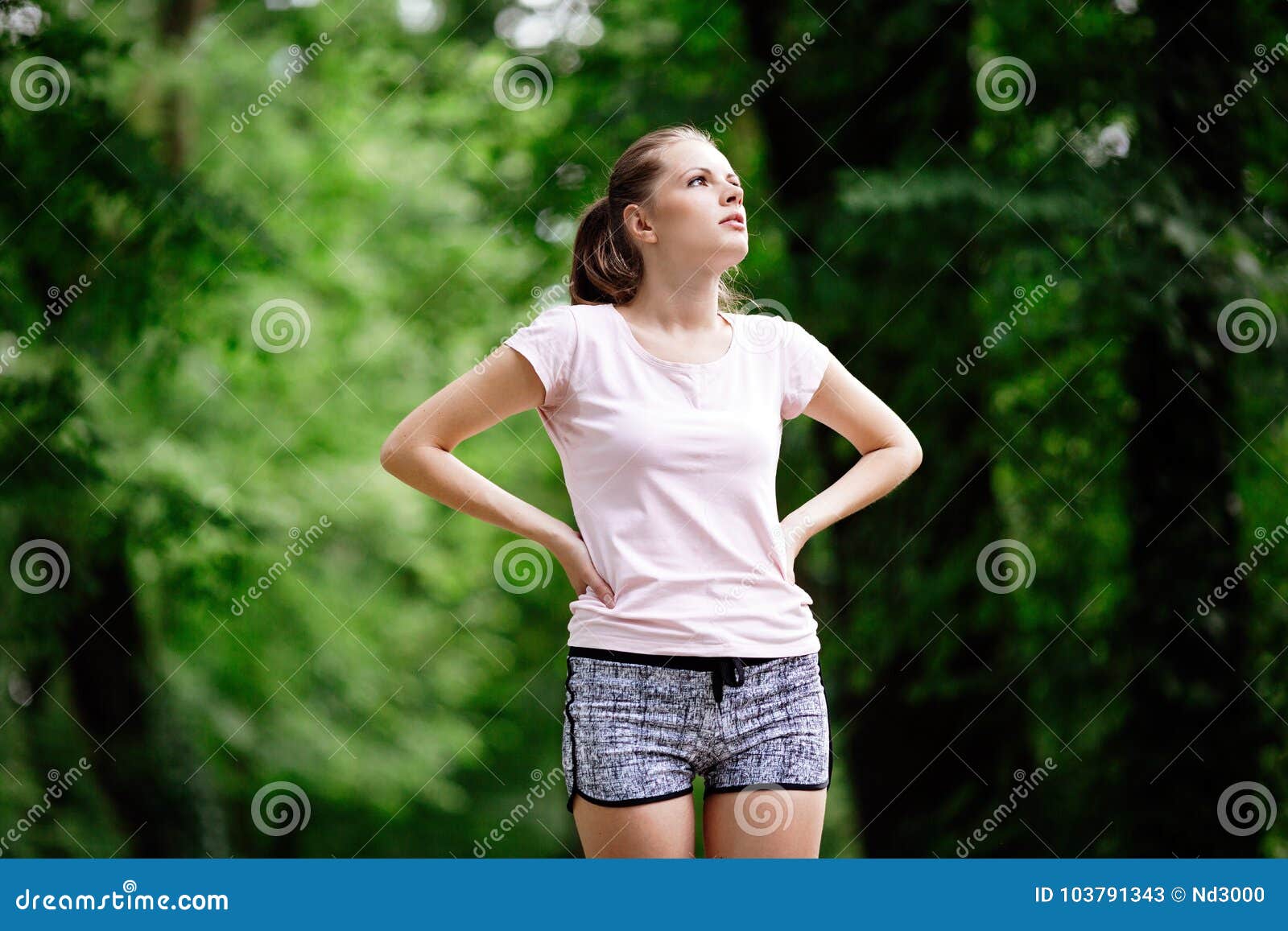Tired female jogger stock image. Image of runner, thirsty - 103791343
