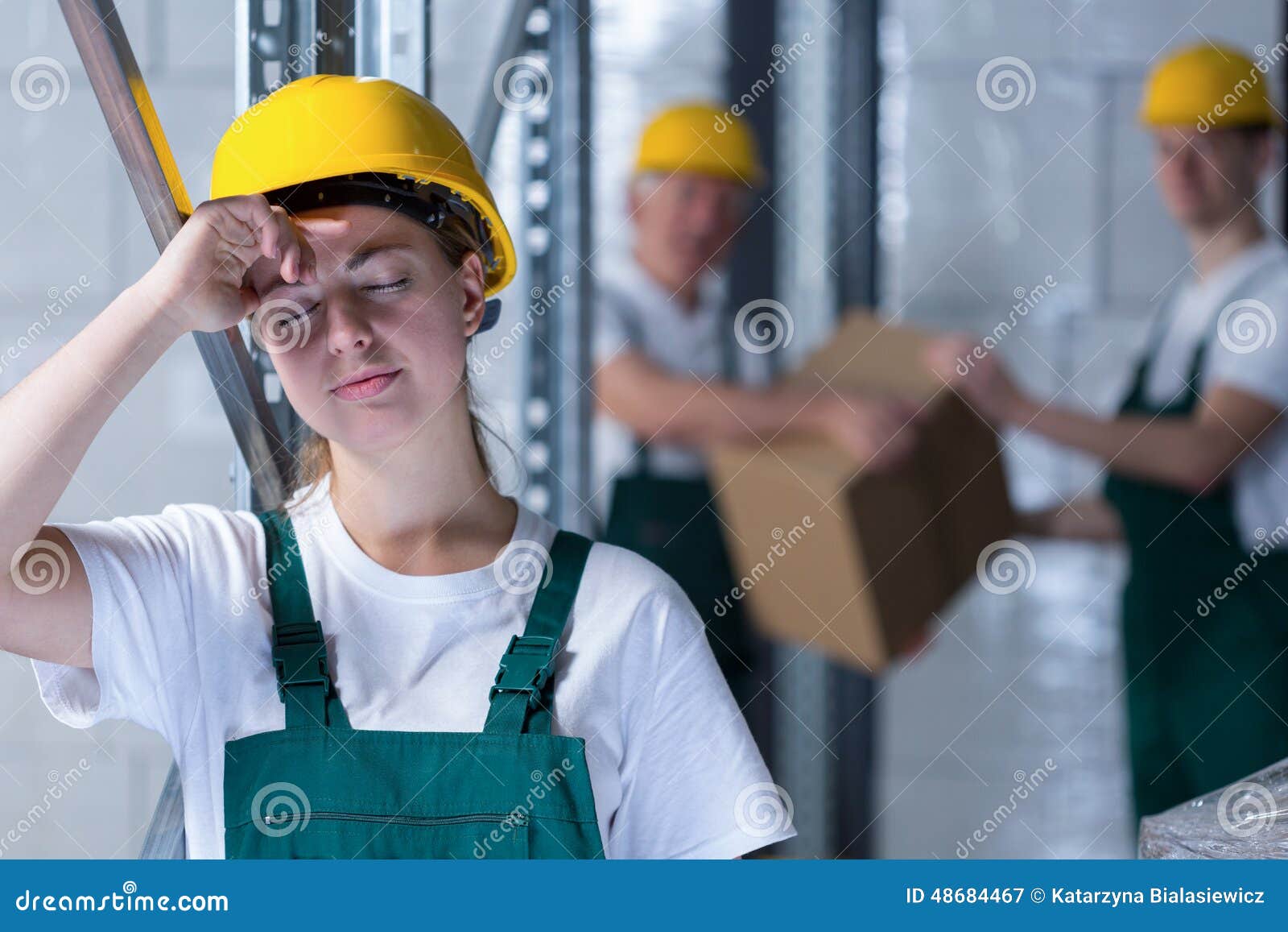 Tired female plant worker stock image. Image of carrying - 48684467