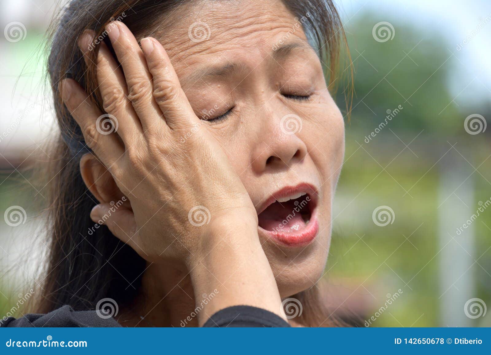 A Tired Filipina Woman stock photo. Image of women, lady - 142650678