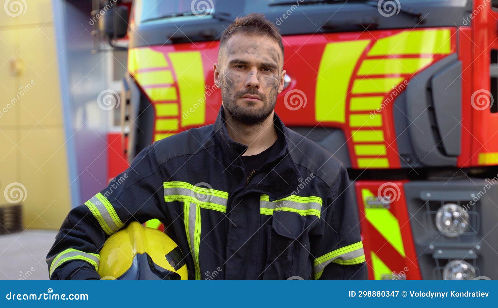 Tired Firefighter in Protective Uniform Looking at Camera while ...